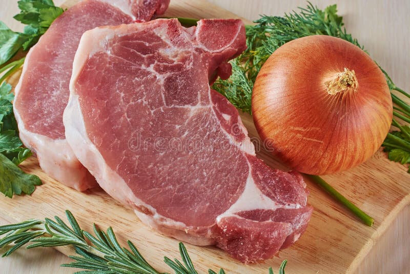 Pork Stake on a Chopping Board Stock Image - Image of bone, meat: 63664011