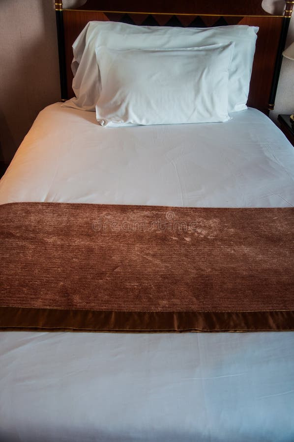 Fresh bed in hotel room stock image. Image of simply - 50877223