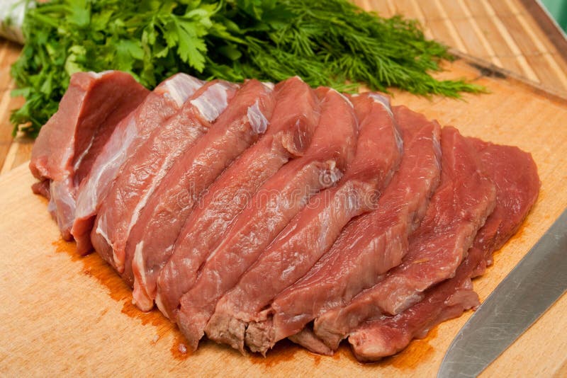 Fresh beef on board stock photo. Image of portion, herb - 11782308