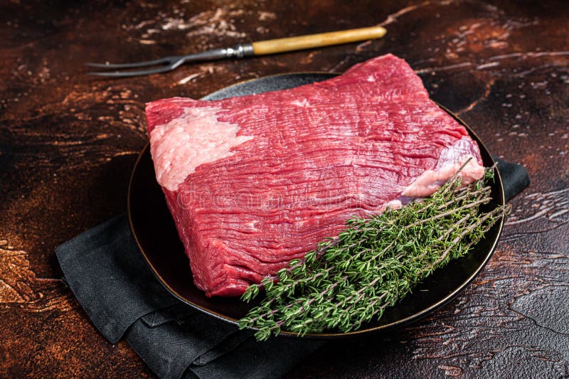 Fresh Beef Brisket, Raw Meat with Herbs. Dark Background Stock Photo ...