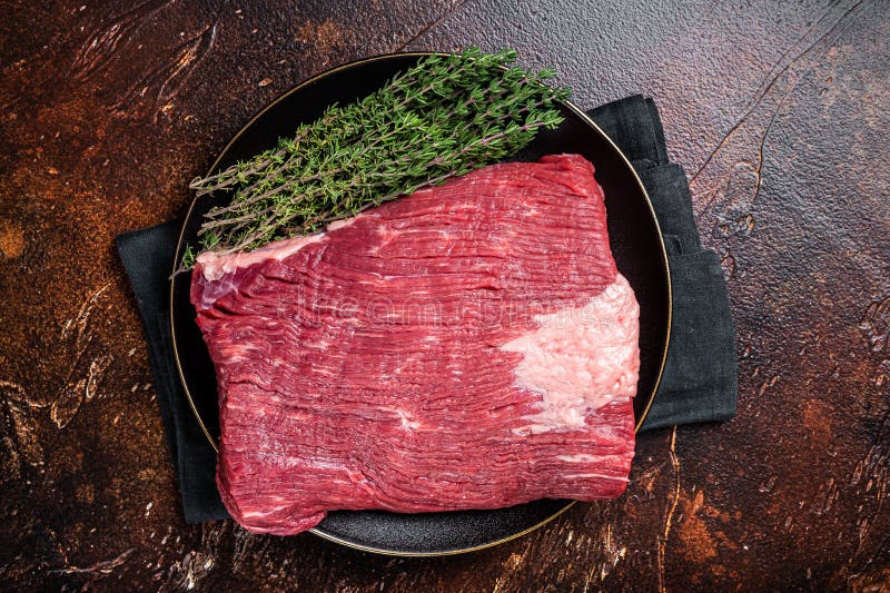 Fresh Beef Brisket, Raw Meat with Herbs. Dark Background Stock Photo ...