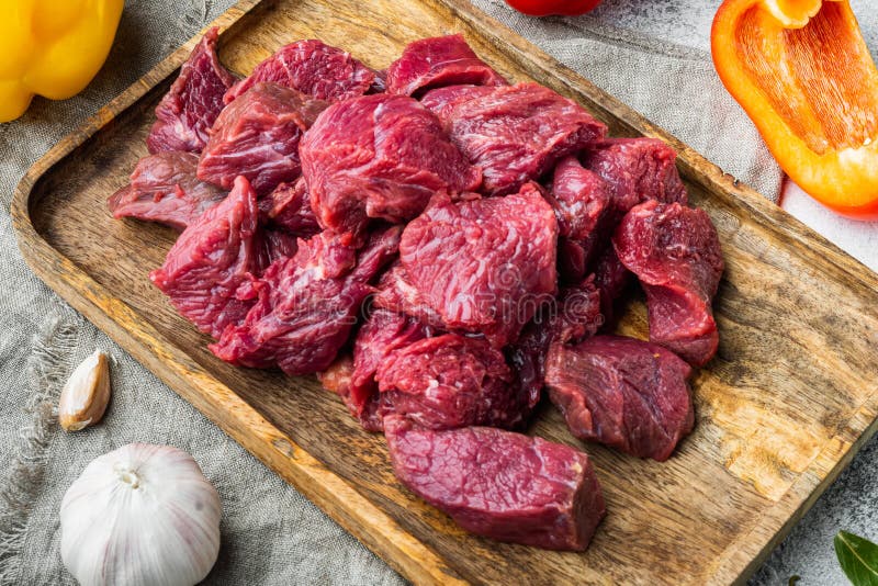 Fresh Beef Chunks Served on Table with Ingredients Ready for Cooking ...