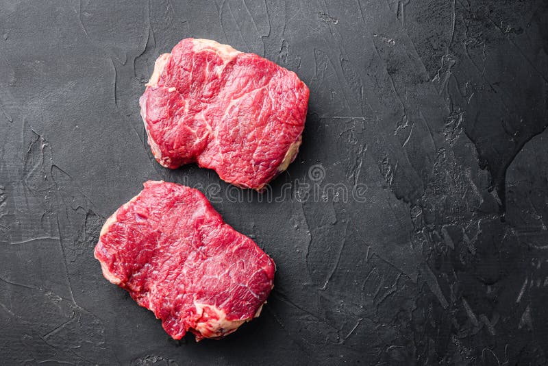 Fresh Beef Rump Steaks Over Black Background, Top View with Space for ...