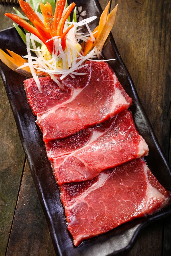 Fresh Beef Slice On Wooden Background Stock Photo - Image of medium ...