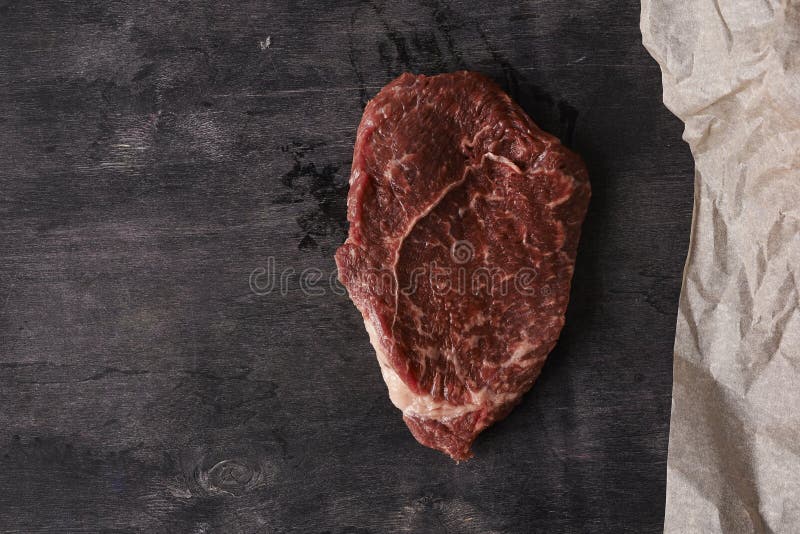 Fresh Beef in Wrapped Paper Stock Photo - Image of butcher, veal: 193158198