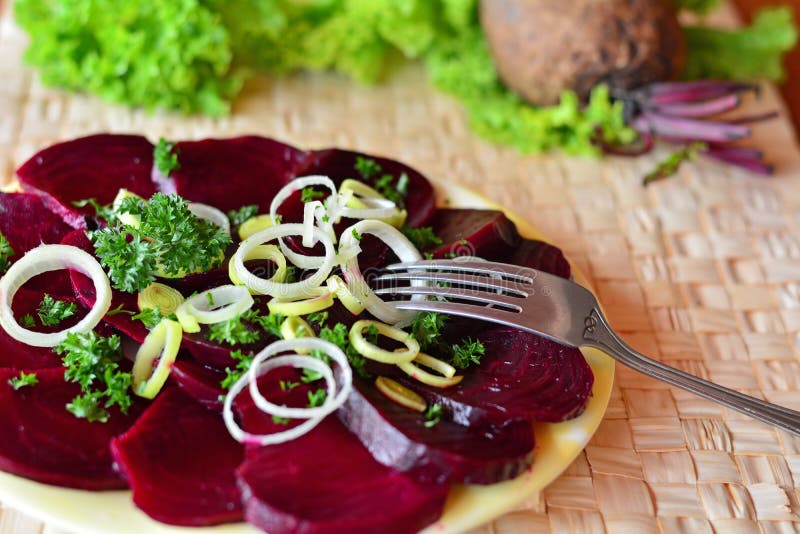 Fresh Beetroot Salad with Chopped Onion on the White Plate Stock Photo ...