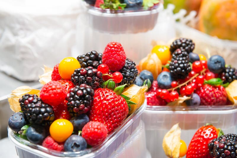 Fresh berries in the boxes stock photo. Image of diet - 73739744