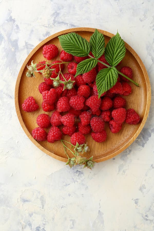 Fresh bery on wood plate stock image. Image of wooden - 76684289