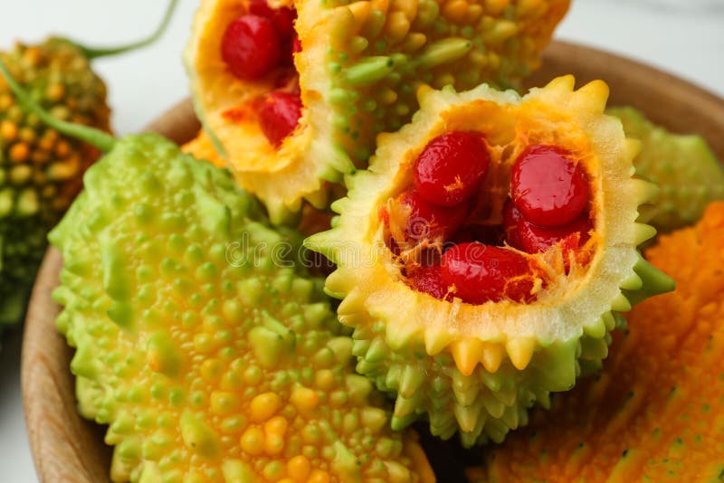 Fresh Bitter Melons in Wooden Bowl, Closeup Stock Photo - Image of ...
