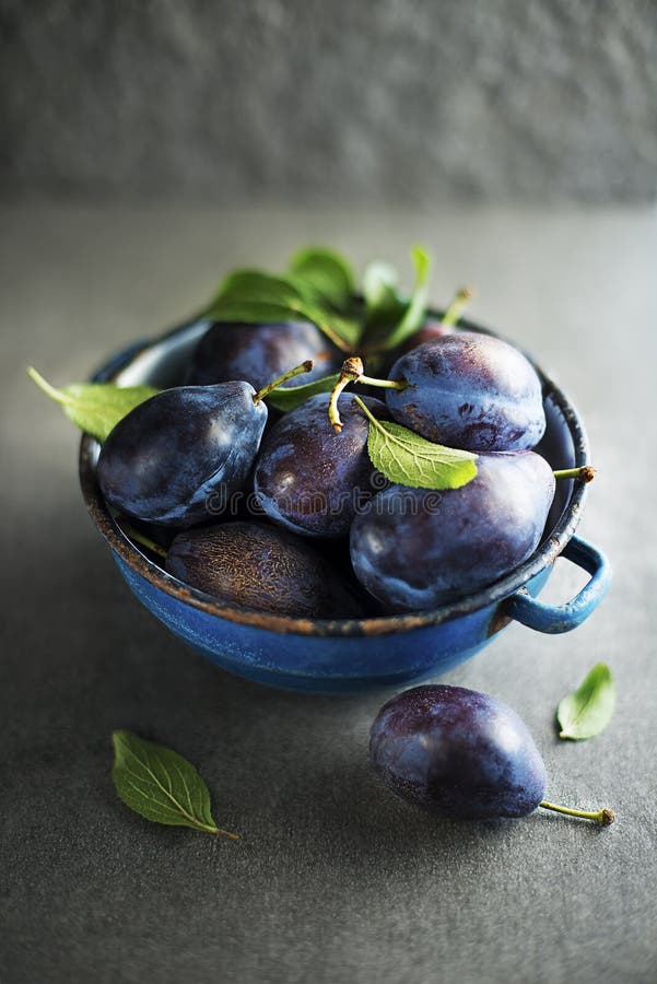 Blue Plums in bowl stock photo. Image of plums, ingredient - 124877144