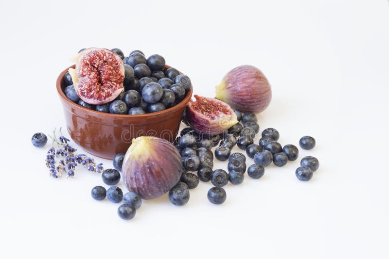 Fresh Blueberries and Figs in Pottery Stock Photo - Image of blueberry ...