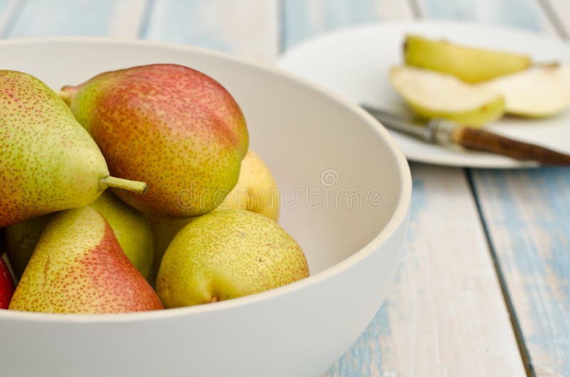 Blush Pears In Plastic Container Stock Photo - Image of package, food ...