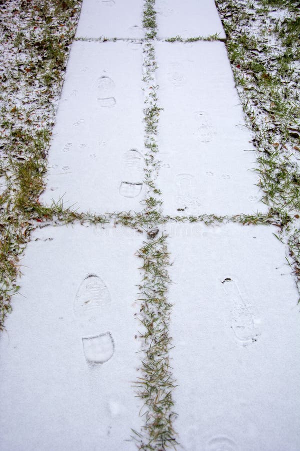 Fresh Bootprints in the Snow. the First Snow on the Path Stock Photo ...