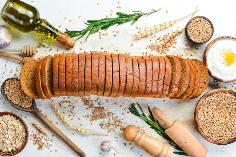 Fresh Bran Bread on an Old Kitchen Table. Baking from Rye and Flour ...