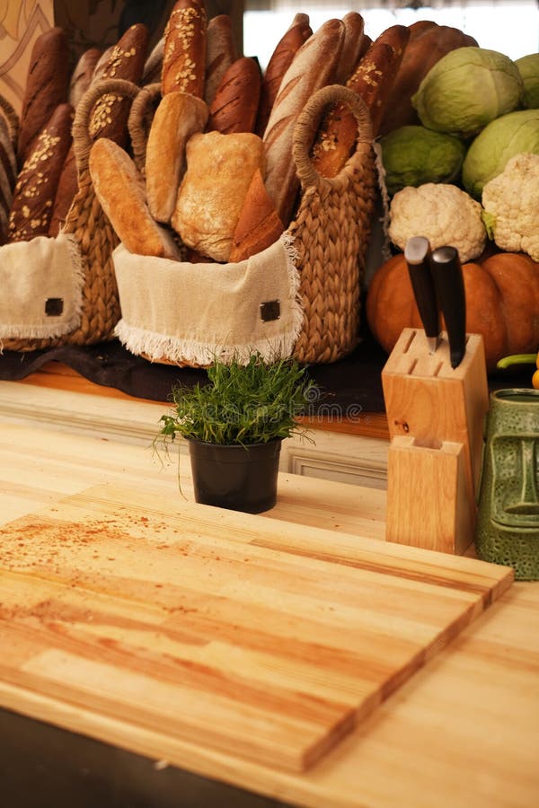 Fresh Bread in a Basket on the Table. Assortment of Pastries on the ...