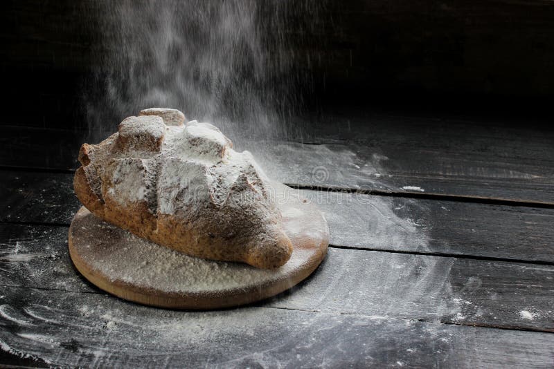 Fresh Bread with Flour on a Rustic Wooden Table Stock Photo - Image of ...