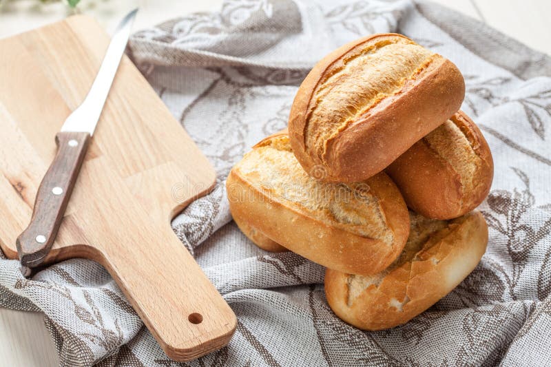 Freshly baked crusty rolls stock image. Image of food - 297031431