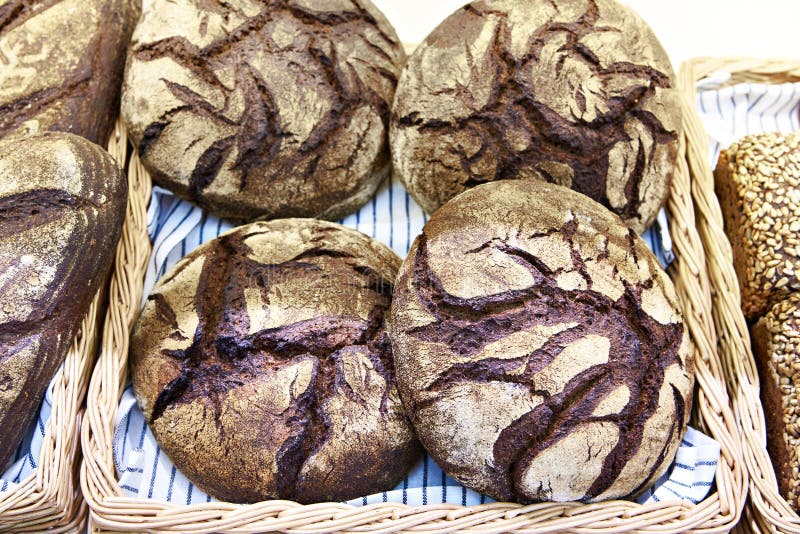 Fresh bread in bakery stock photo. Image of grain, black - 214418220