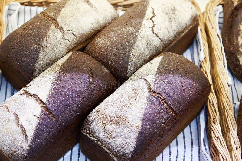 Fresh bread in bakery stock photo. Image of basket, full - 214418260
