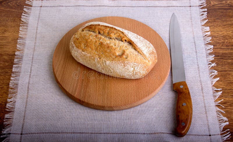 Fresh Bread Slice and Cutting Knife on Table Stock Image - Image of ...