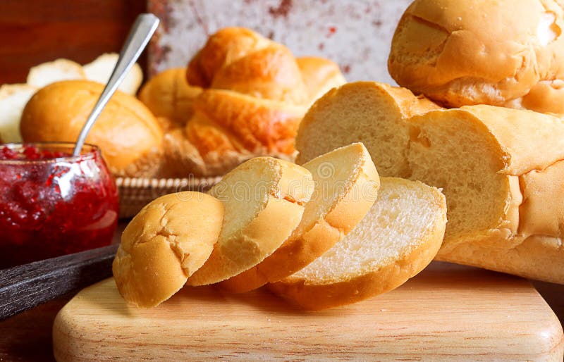 Fresh Bread Slide on Wood Cutting Board and Jam Stock Image - Image of baked, grain: 95208061