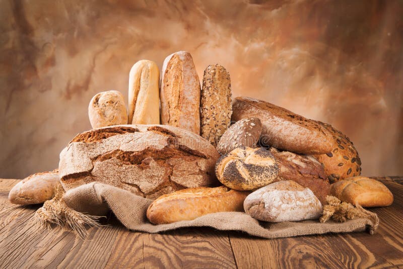 Fresh bread on wood stock photo. Image of brown, gourmet - 33109252