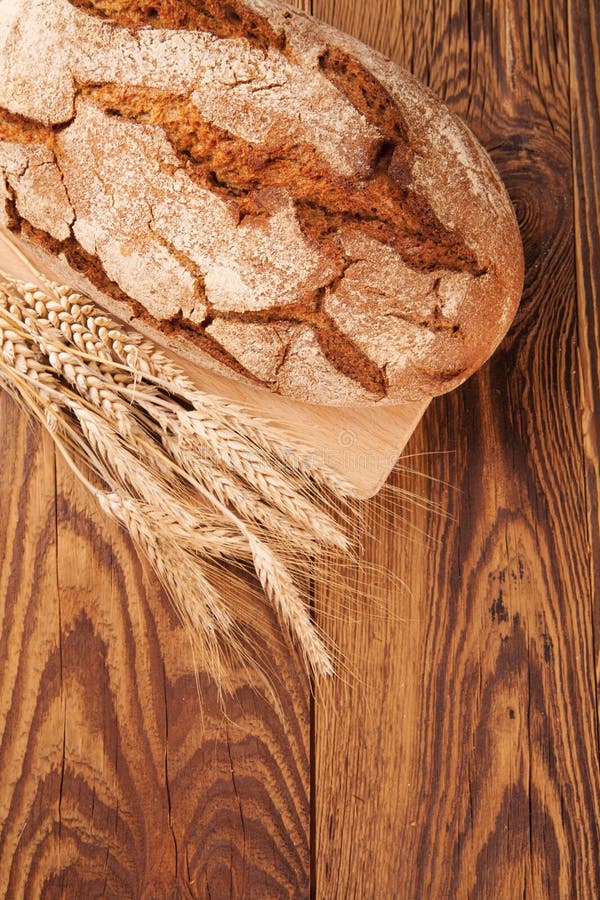 Fresh bread on wood stock image. Image of bread, gold - 33112851