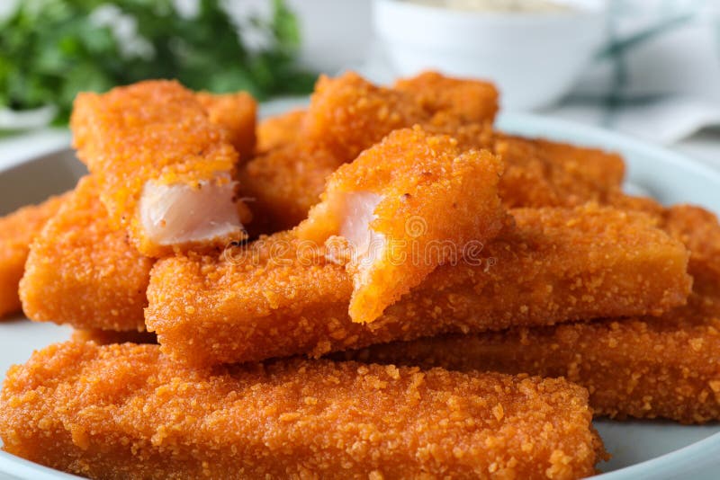 Fresh Breaded Fish Fingers on Plate, Closeup Stock Photo - Image of ...