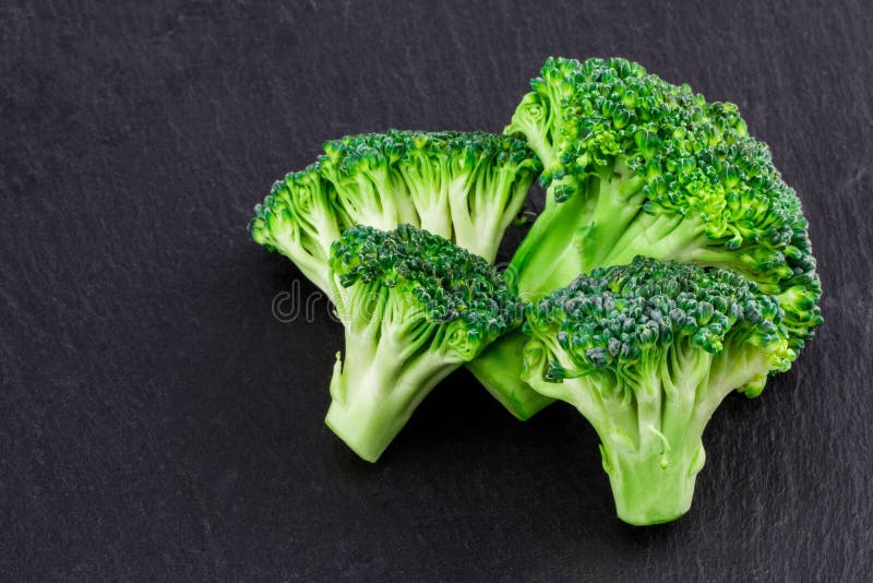Fresh Broccoli on a Black Slate, Top View with Space for Text Stock ...