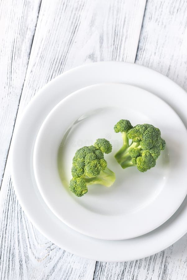 Fresh Broccoli on the White Plate Stock Photo - Image of diet, broccoli ...