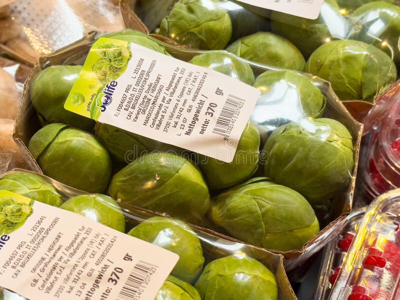 Fresh Brussels Sprouts Packaged in Cardboard Tray at Market Display ...
