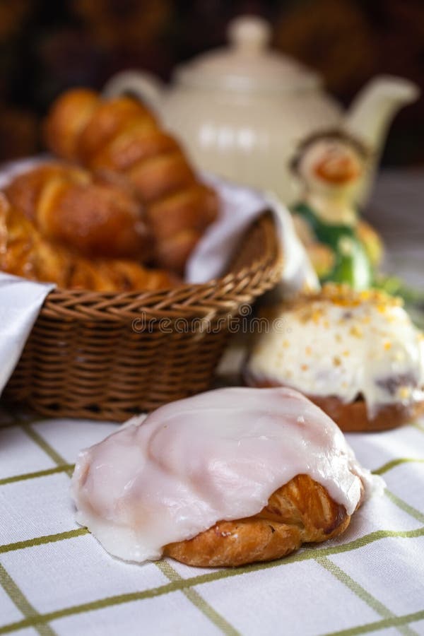 Fresh Bun Covered with White Icing on the Table Stock Image - Image of ...