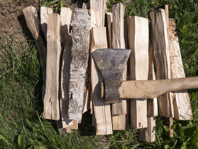 Fresh Bundle of Wooden Firewood Slivers and Old Iron Axe with Wooden ...