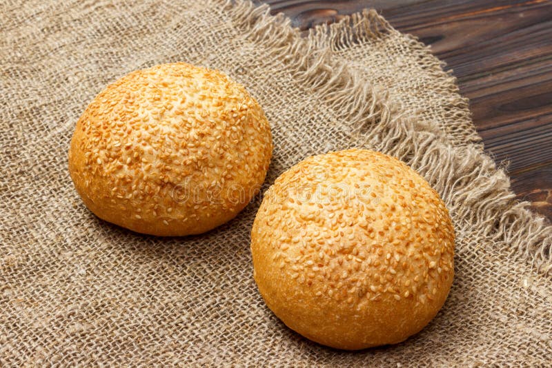 Fresh Buns on Wooden Table. Top View Close Up Stock Photo - Image of ...