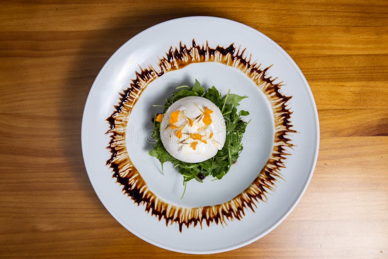 Fresh Buratta with Salad Mix Stock Photo - Image of arugula, salad ...