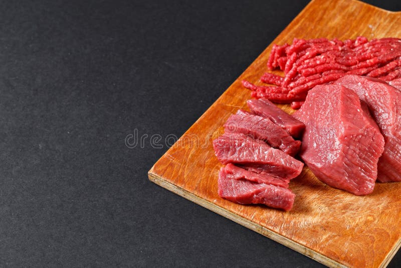 Fresh Butcher Cut Meat Assortment On Black Background Stock Image ...