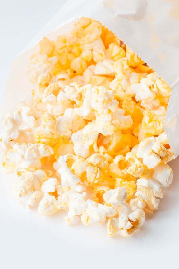Fresh Butter Popcorn Falling Out of Pack Stock Image - Image of popcorn ...