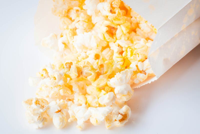 Fresh Butter Popcorn Falling Out Stock Image - Image of crunchy, paper ...