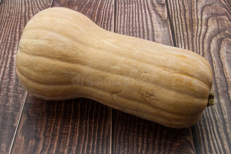 Fresh Butternut Squash Over Wooden Background Stock Image - Image of ...