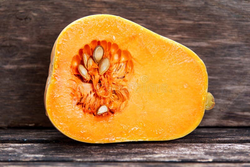 Fresh Butternut Squash Slice on Wooden Table Stock Photo - Image of ...