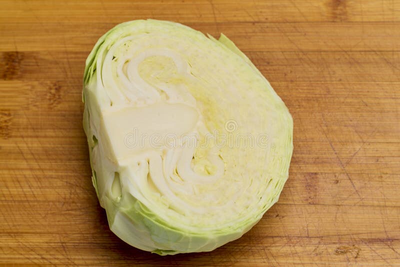 Fresh cabbage cut in half stock photo. Image of cabbage - 307115672