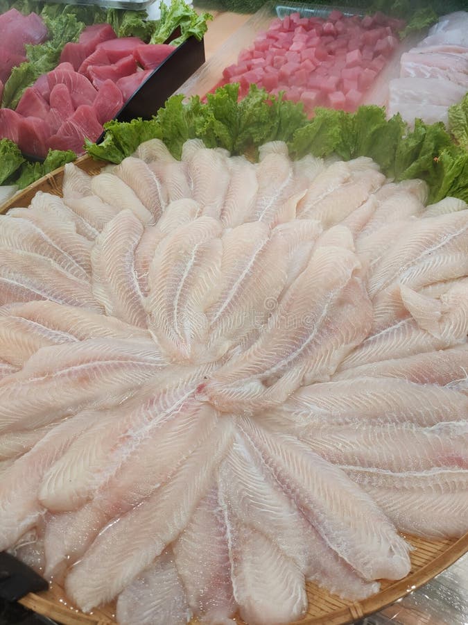 Fresh Catfish Fillets on Ice Stock Photo - Image of mist, fillets ...