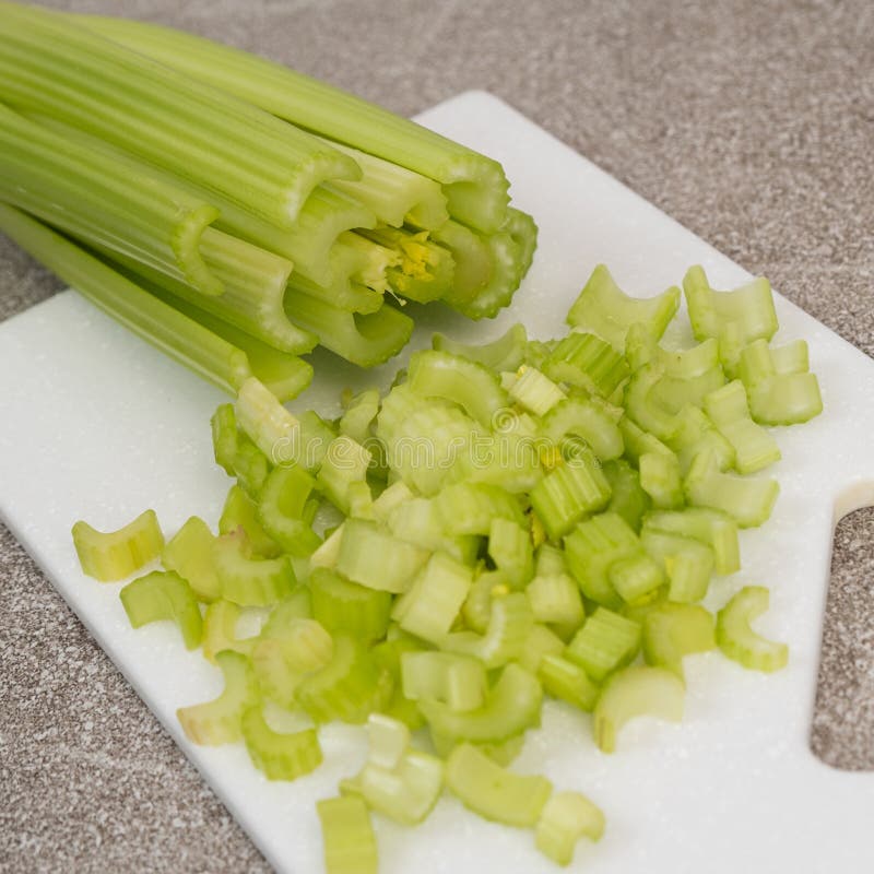 Fresh Celery on Cutting Board Ready for Meal Prep Stock Image - Image ...