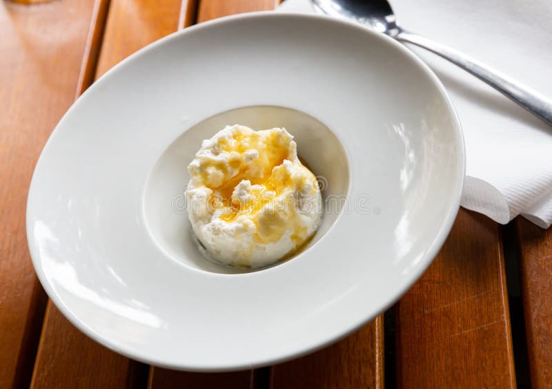 Fresh Mato Cheese from Ship Milk with Honey on Plate Stock Photo ...