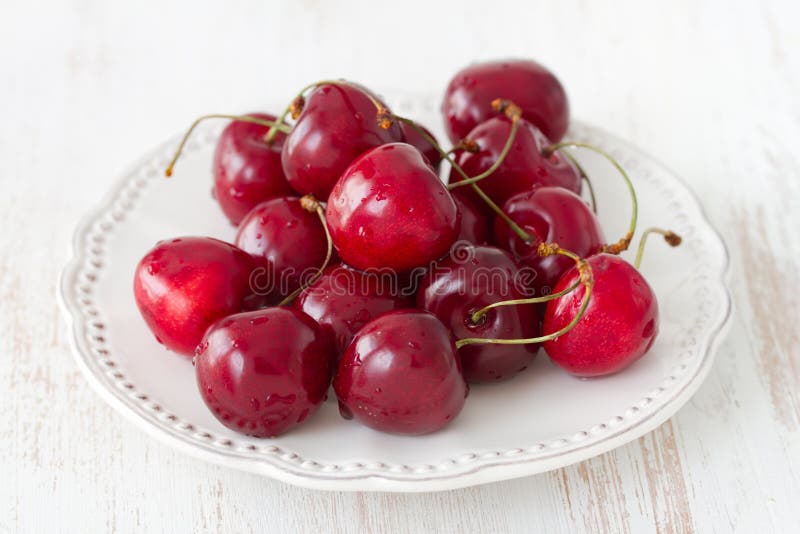 Fresh cherry on plate stock photo. Image of color, dessert - 31962476