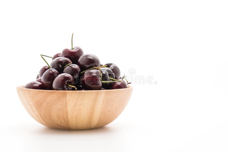 Fresh cherry on wood plate stock photo. Image of group - 92890628