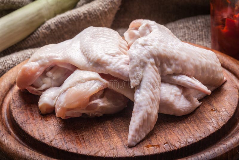 Fresh chicken wings. stock photo. Image of preparation - 97888802
