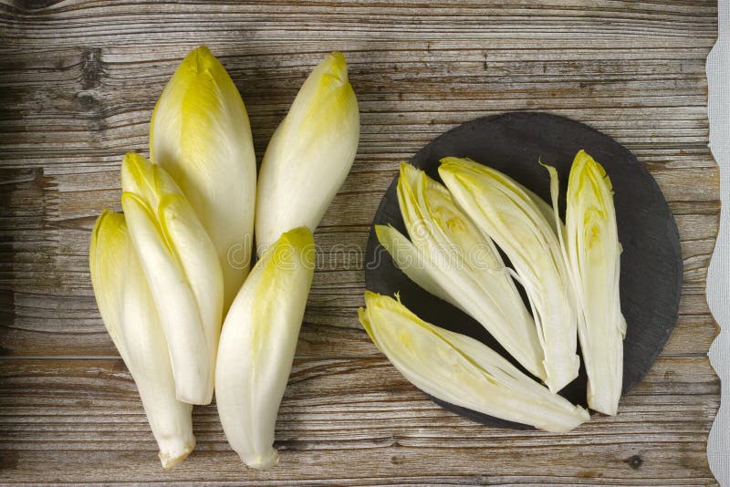 Fresh Chicory Salad Leaves Placed on a Blue Plate Stock Image - Image ...