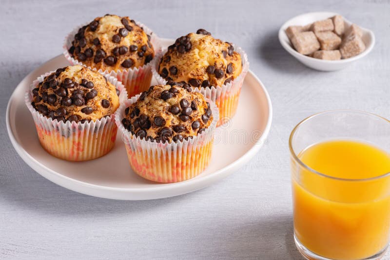Fresh Chocolate Muffin and Orange Juice Stock Image - Image of brown ...