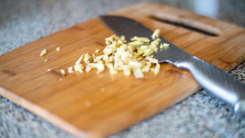 Chopped Ginger with Knife on Cutting Board Side View Stock Image ...